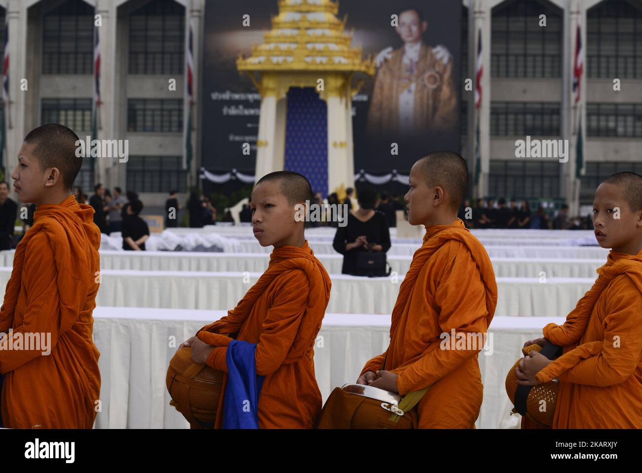 Thai Buddhist monks give alms a merit in front of Bangkok's City Hall ...