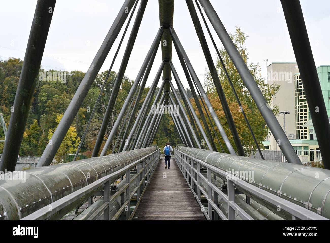 Two, pipelines painted green, in diminish perspective on both sides of ...