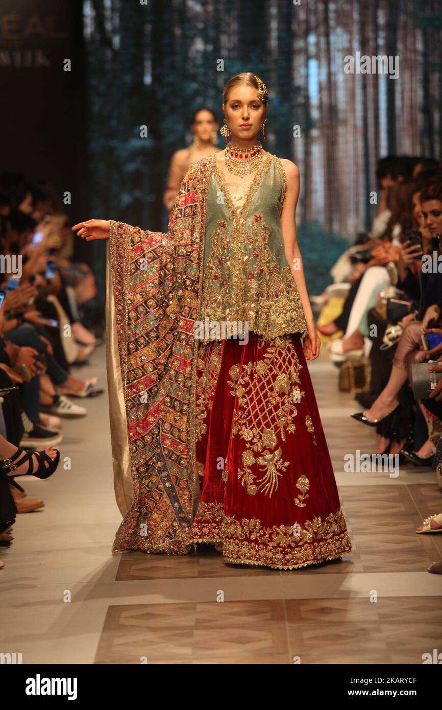 Fashion models walks on the ramp during the first day of the PFDC L ...