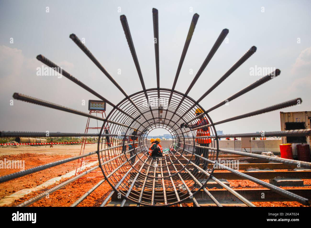 Bangladeshi construction workers working at the construction site of ...