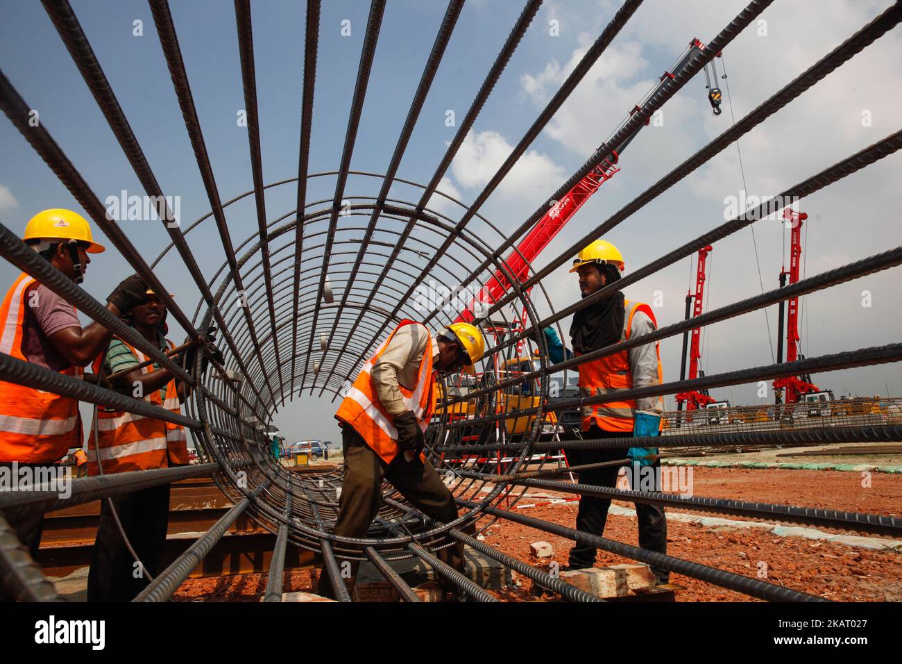 Bangladeshi construction workers working at the construction site of ...