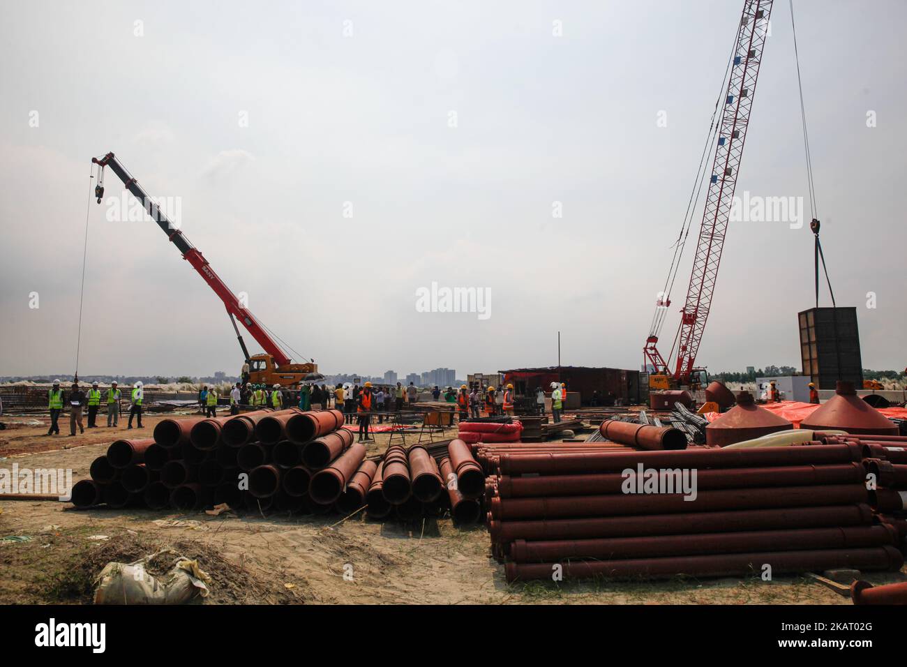 Bangladeshi construction workers working at the construction site of ...