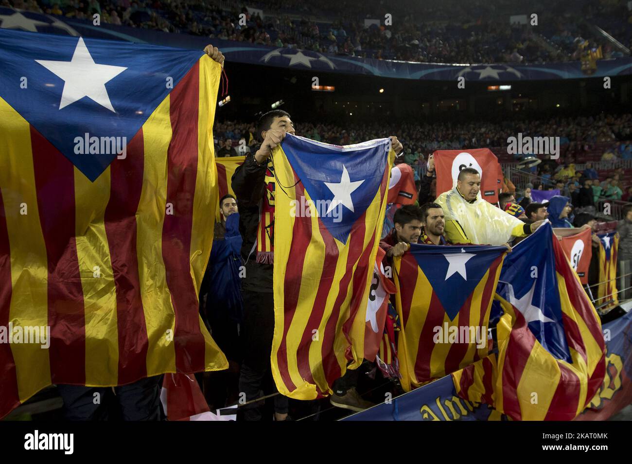 Barcelona's supporters hold independence flags during the UEFA ...