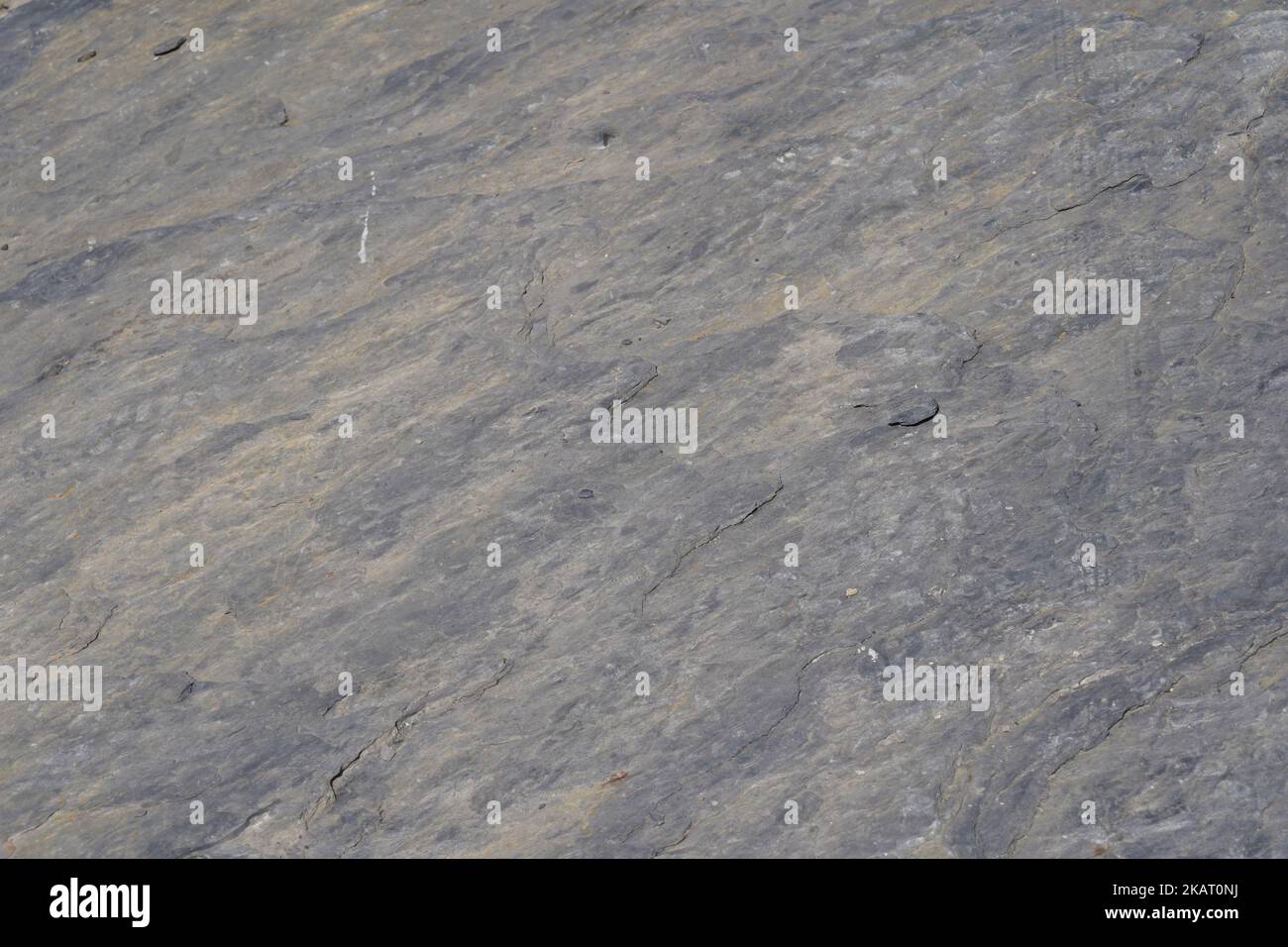 Top view on sedimentary rock of grey color known as flysch with ...