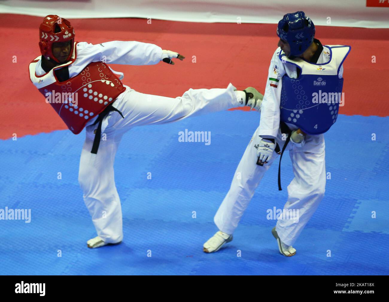 Ahmad Narimani of Iran (Blue) against Biswajit Ray of India (Red) in ...