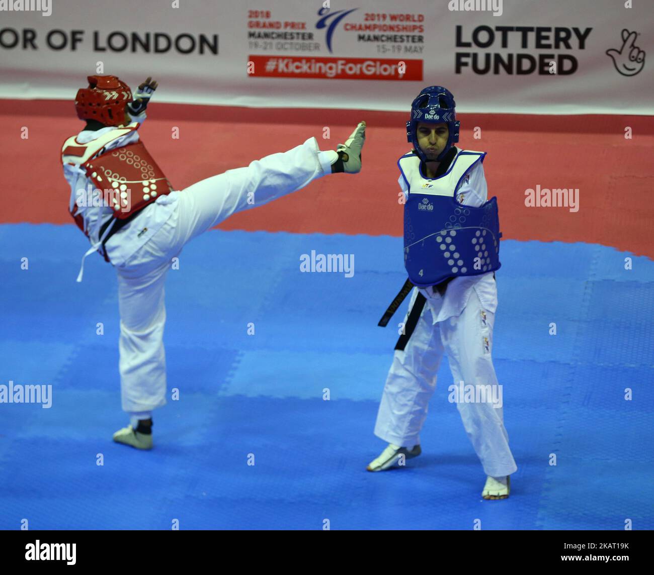 Ahmad Narimani of Iran (Blue) against Biswajit Ray of India (Red) in ...