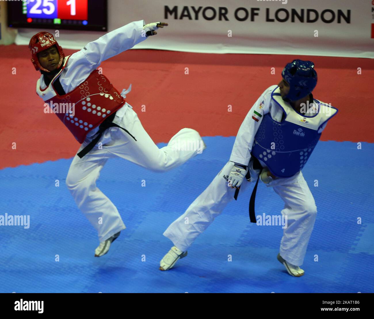 Ahmad Narimani of Iran (Blue) against Biswajit Ray of India (Red) in ...