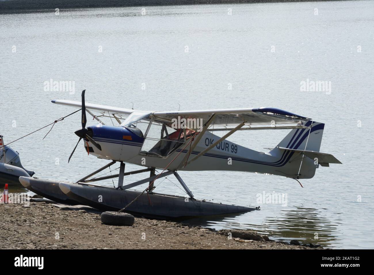 Floatplane or seaplane with two slender floats mounted under the ...
