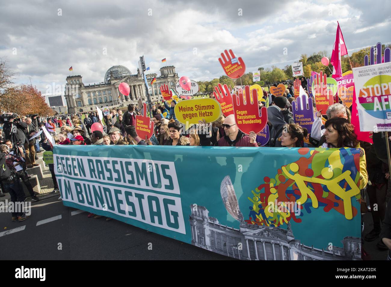 Demonstrators protesting against racism outside the Reichstag, seat of ...