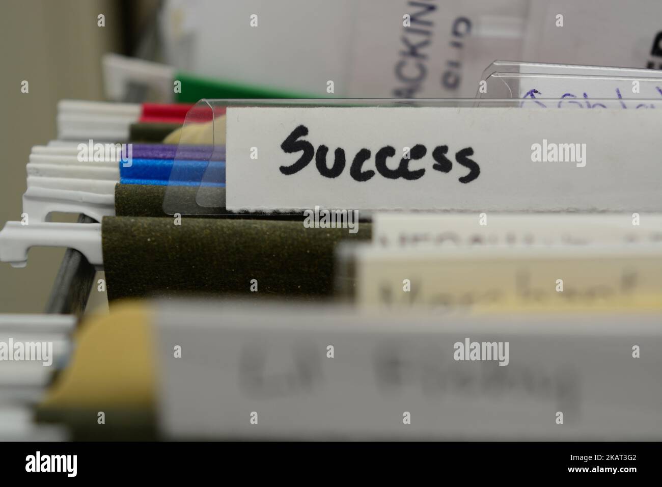 The office files and documents labeled as "success Stock Photo - Alamy