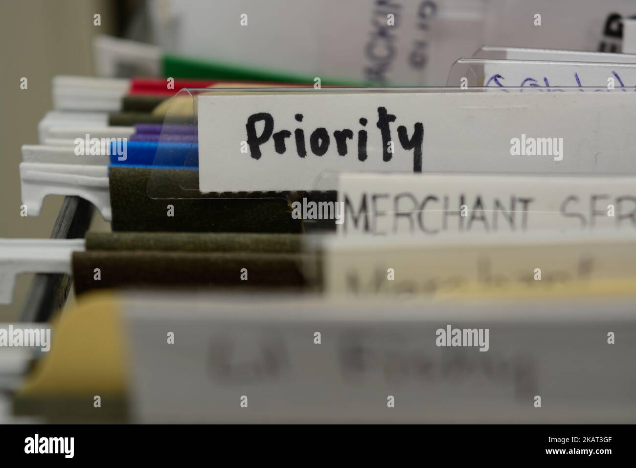 The office files and documents labeled as "priority Stock Photo - Alamy