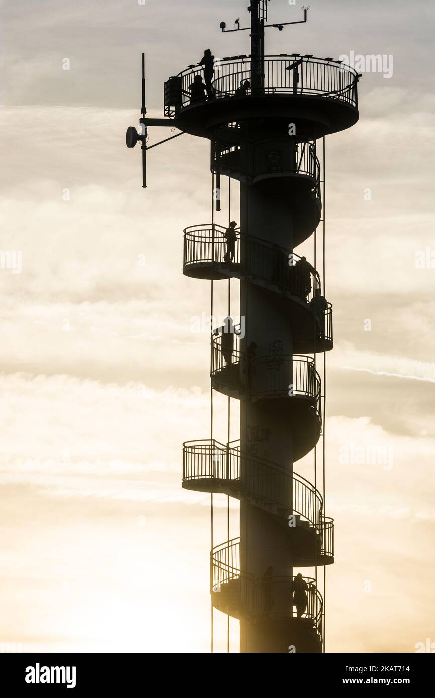 Wien, Vienna: people on observation tower Jubiläumswarte, backlit shot ...