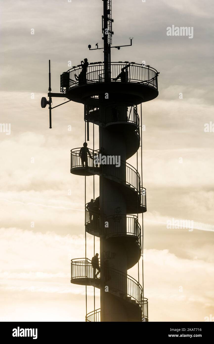 Wien, Vienna: people on observation tower Jubiläumswarte, backlit shot ...