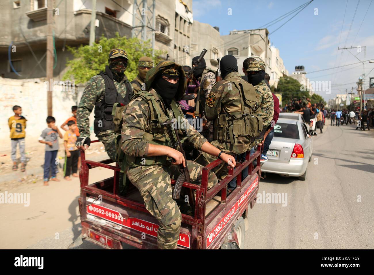 Mourners and members of the Palestinian Islamic Jihad Movement attend a ...