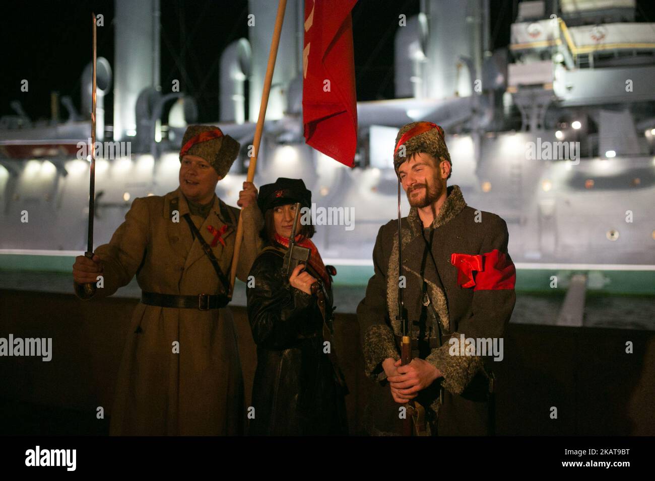 Russian Communist supporters carry red flags and shout slogans as they ...