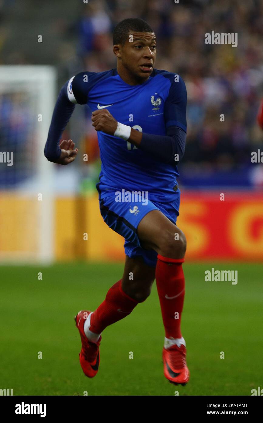 France's forward Kylian Mbappe reacts during the friendly football ...