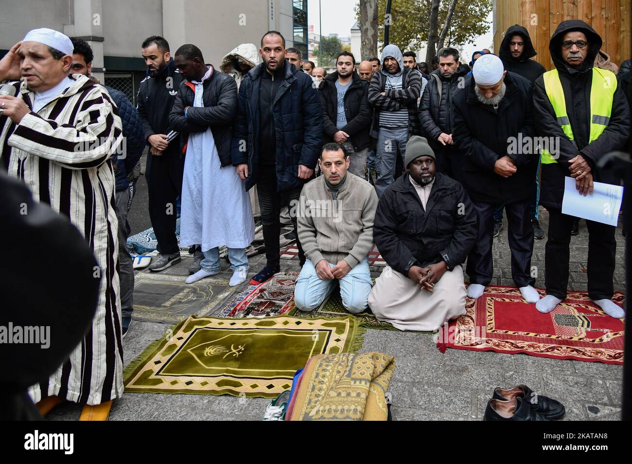 Muslims pray in the streets of paris hi-res stock photography and ...