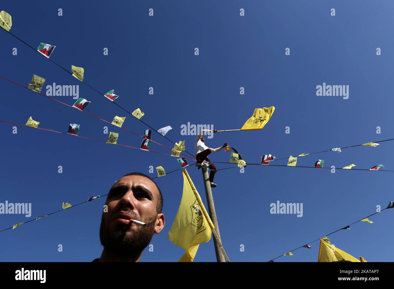 Palestinian Fatah supporters take part in a rally marking the death ...