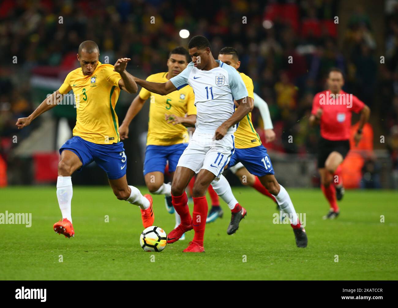 England's Marcus Rashford and Miranda of Brazil during International ...