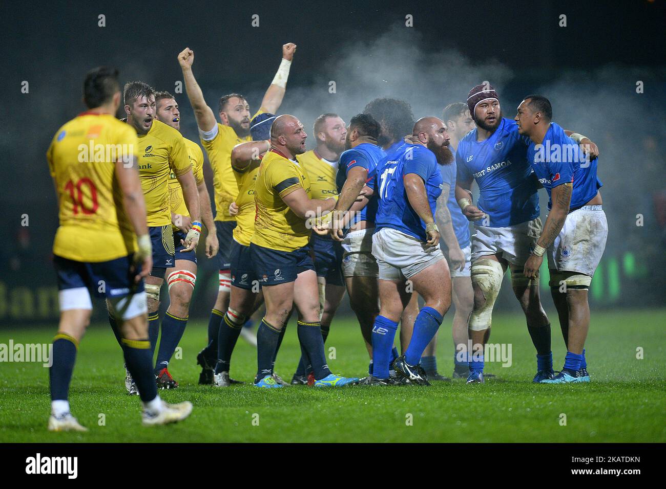 Romania's Mihai Macovei (captain), Samoa's James Lay in action during ...