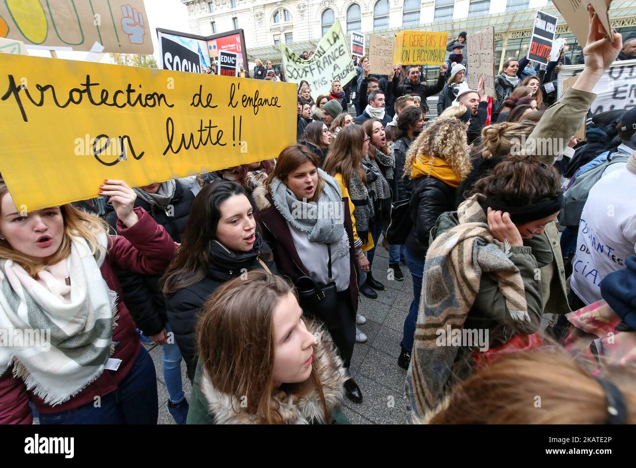 Protesters hold banner reading ‘child protection struggling’ during a ...