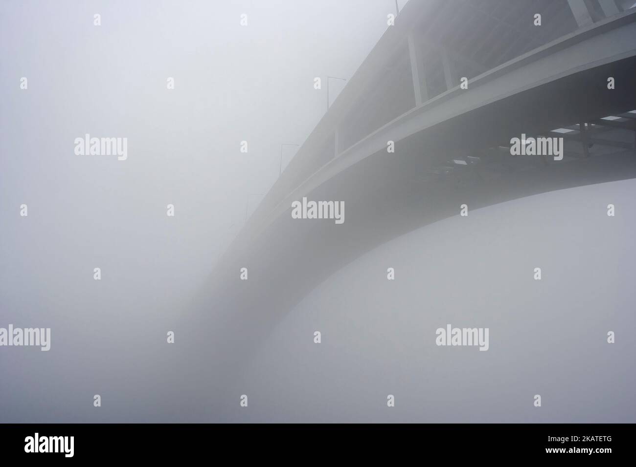 Famous Arrabida bridge over Douro river in the mist Stock Photo - Alamy