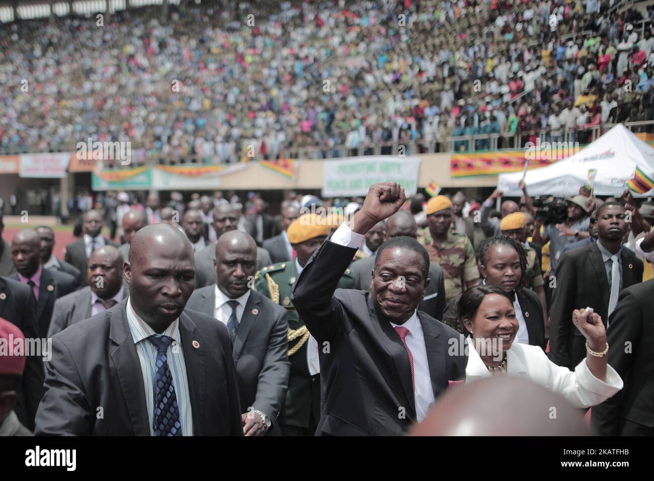 The president Emmerson Mnangagwa and his wife greet Zimbabweans during ...