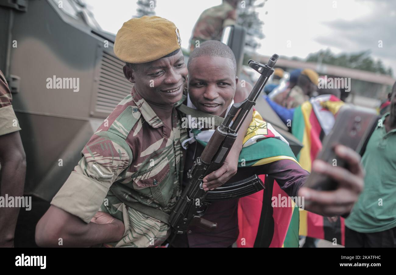 Zimbabwean man takes photo with military during inauguration of new ...