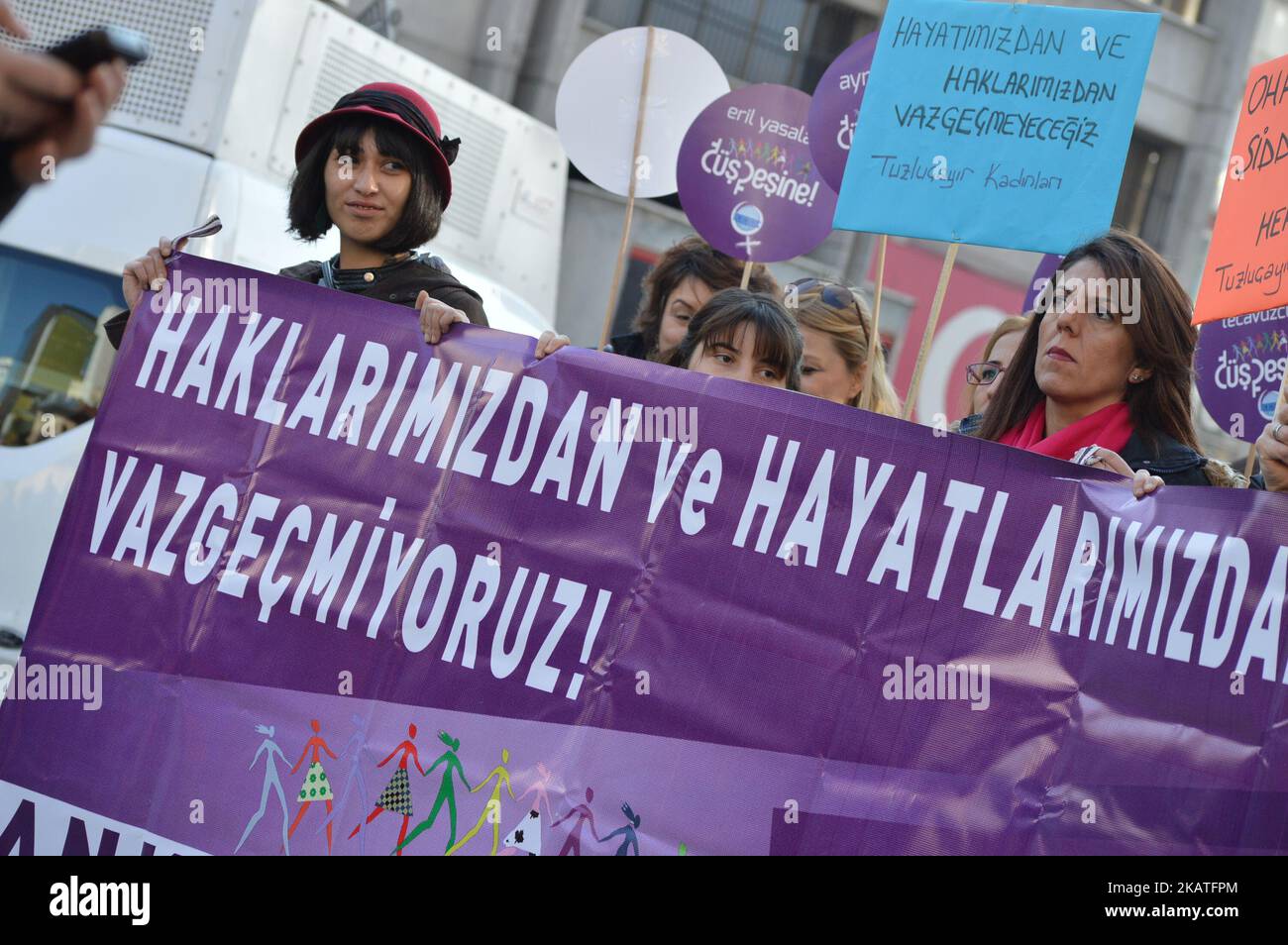Kurdish and Turkish women take part in a protest to protect their ...