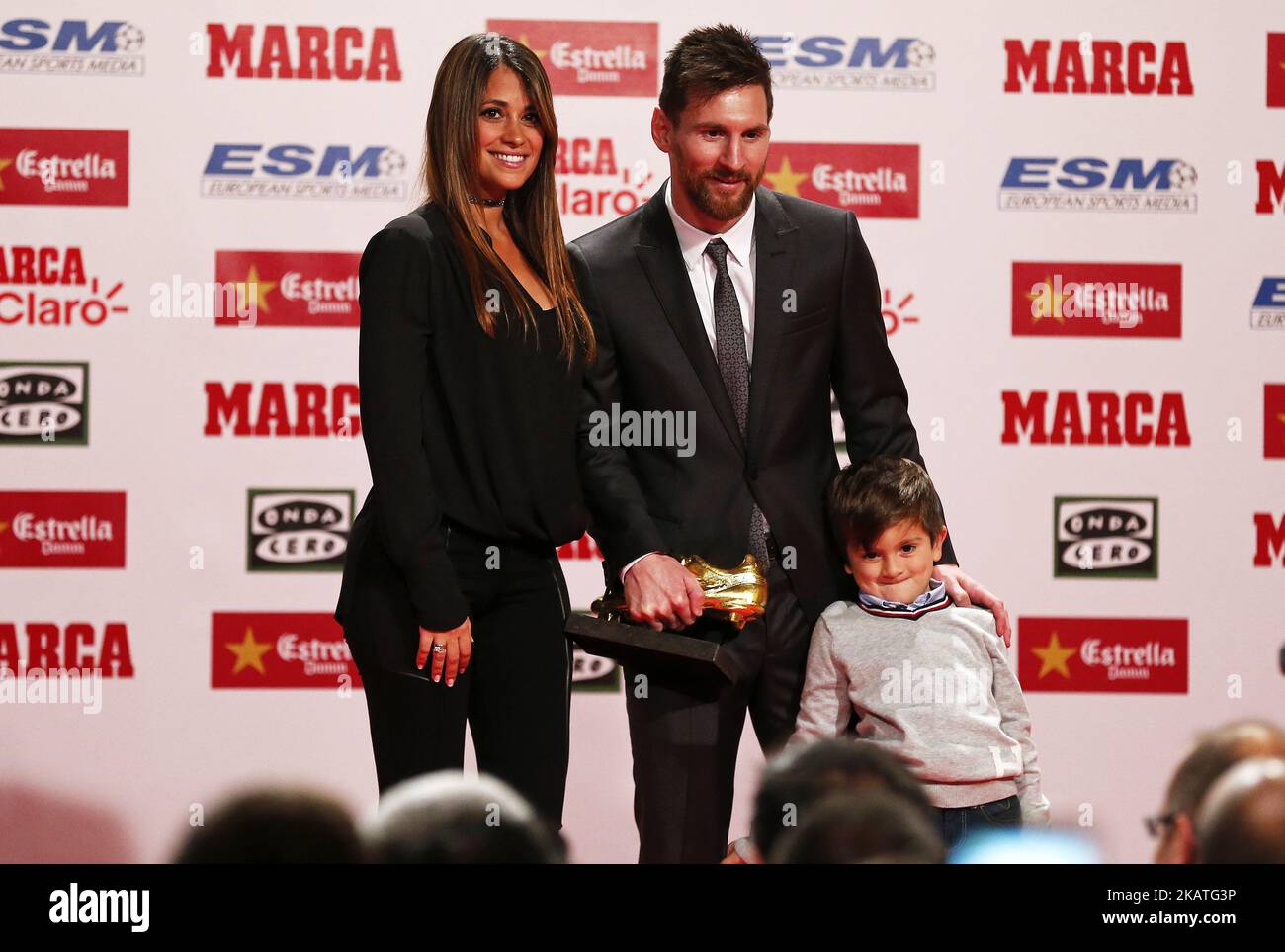 Barcelona's Argentinian forward Lionel Messi (C), his spouse Antonella ...
