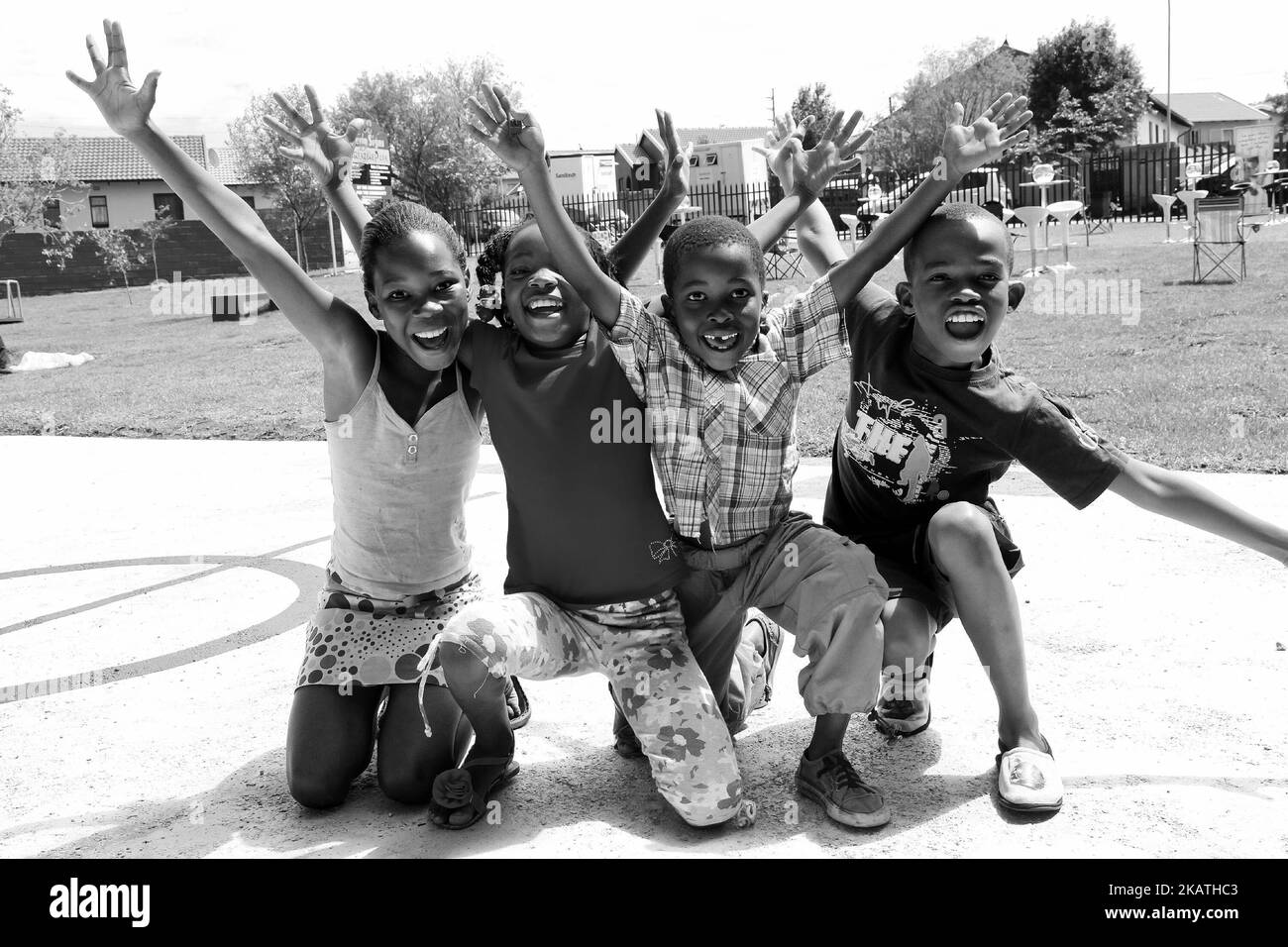 African kids posing for a photo at local public park in Johannesburg ...