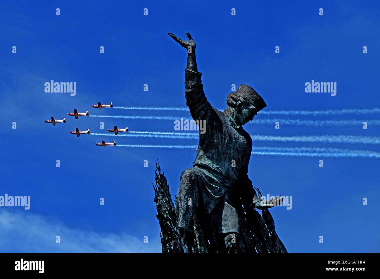 Planes from the Indonesian Air Force's Jupiter Aerobatic Team fly over ...