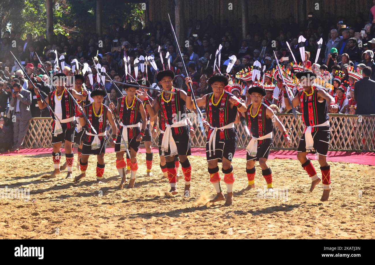Angami Naga tribes perform on the first day of the Hornbill Festival at ...