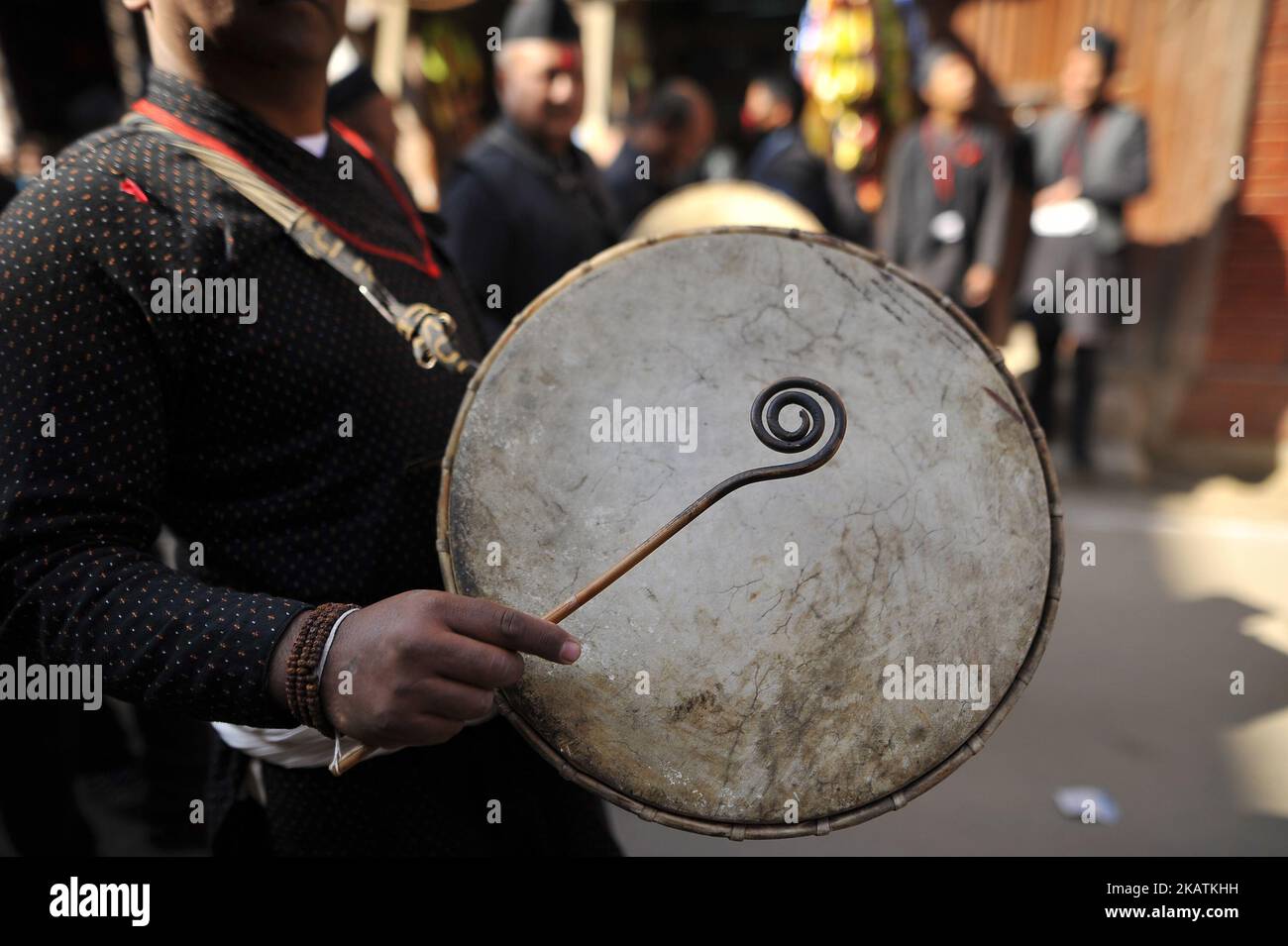 People from Newar community play traditional instruments during a ...