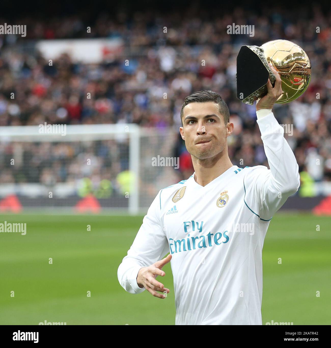 Cristiano Ronaldo of Real Madrid shows his recent won Golden Ball ...