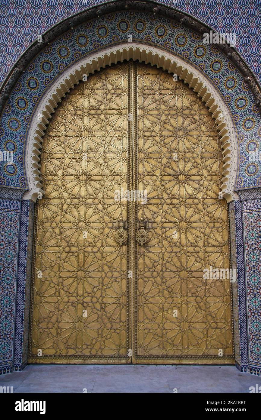 The entrance with the golden gates in the old Royal Palace in Fez ...