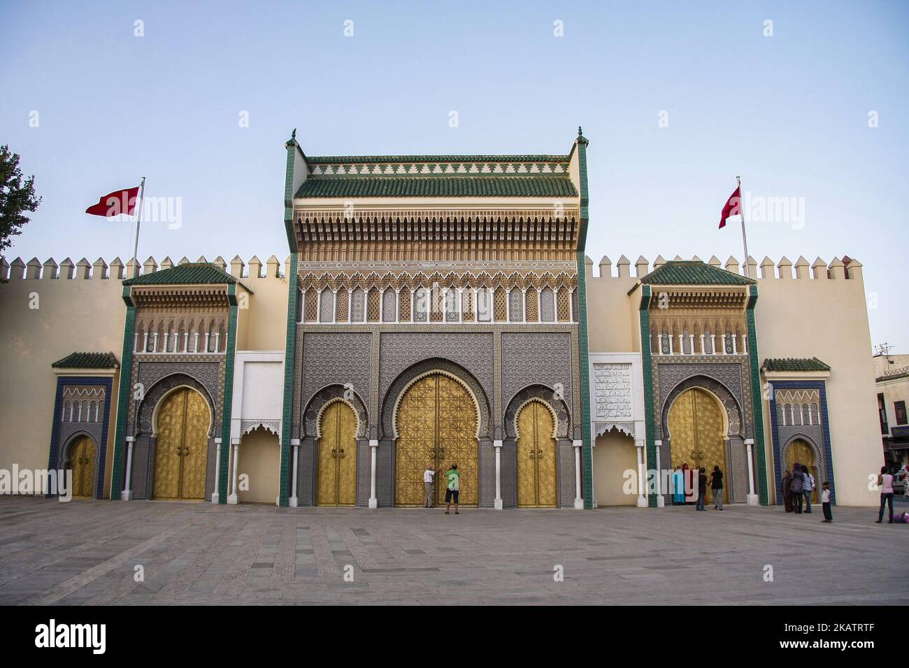 The entrance with the golden gates in the old Royal Palace in Fez ...