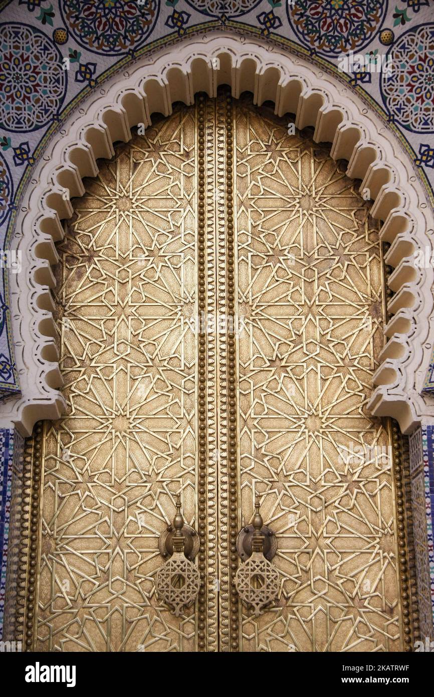 The entrance with the golden gates in the old Royal Palace in Fez ...