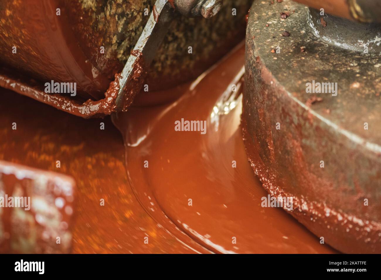 Old vintage grinding machine making chocolate, close up Stock Photo - Alamy