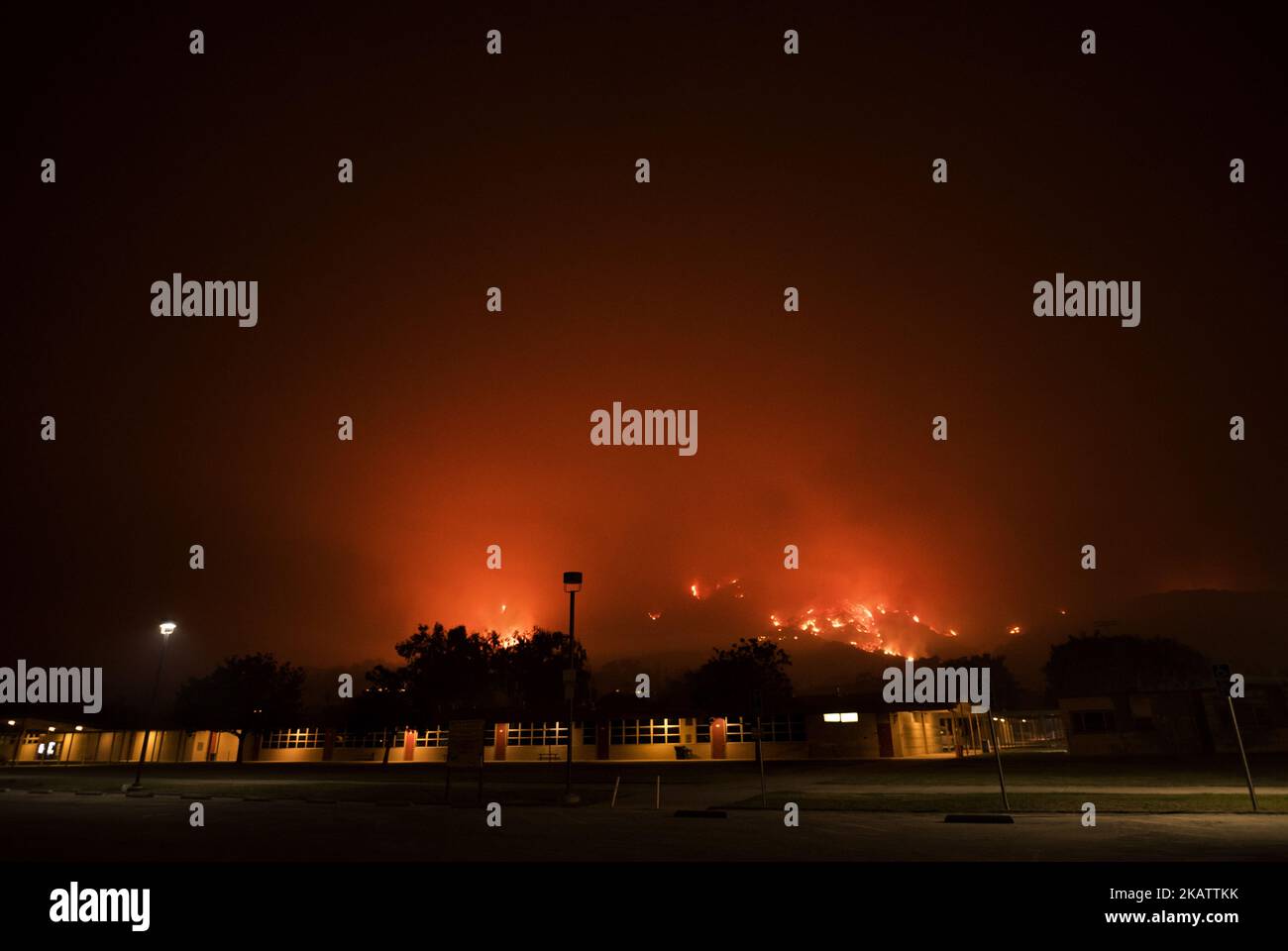 The Thomas wildfire burns in the hills behind Carpinteria High School ...