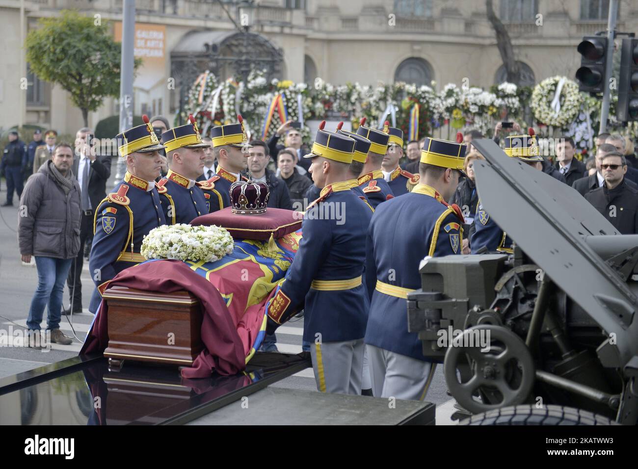 Honor guard soldiers carry the coffin of the late Romanian King Michael ...