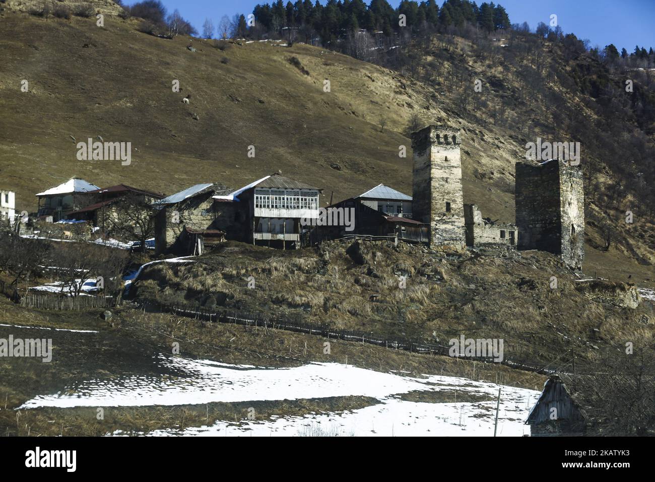 Snow covered Ushguli village at the foot of Mt. Shkhara in Georgia ...