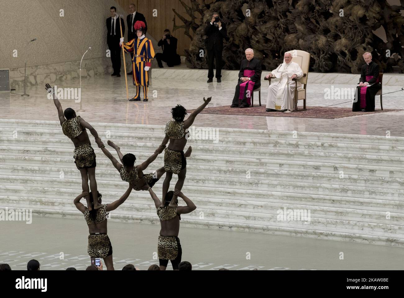Artists of the Golden Circus perform in front of Pope Francis during ...