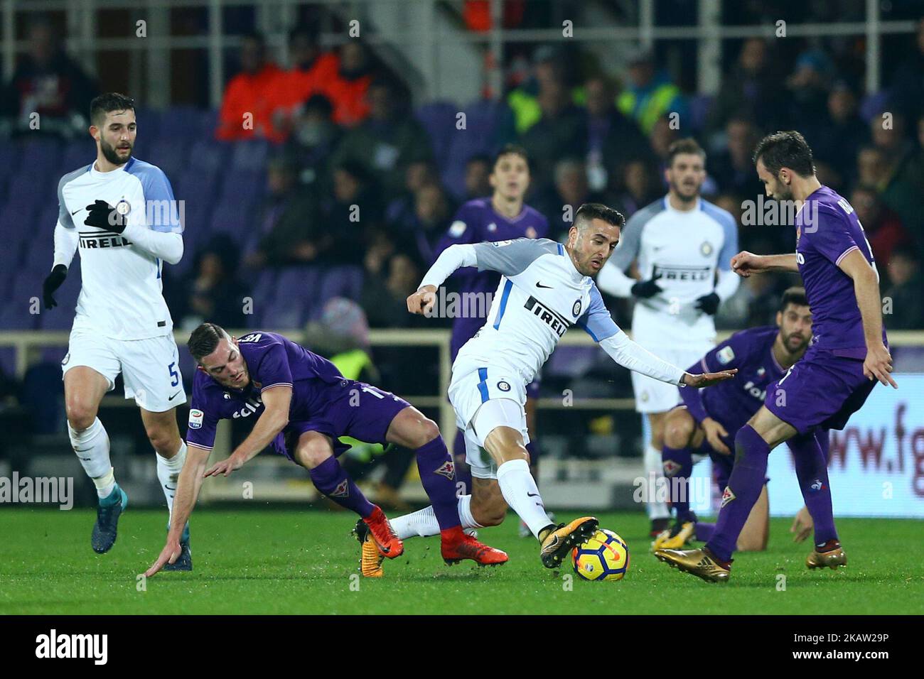 Jordan Veretout of Fiorentina tackling on Matas Vecino of ...
