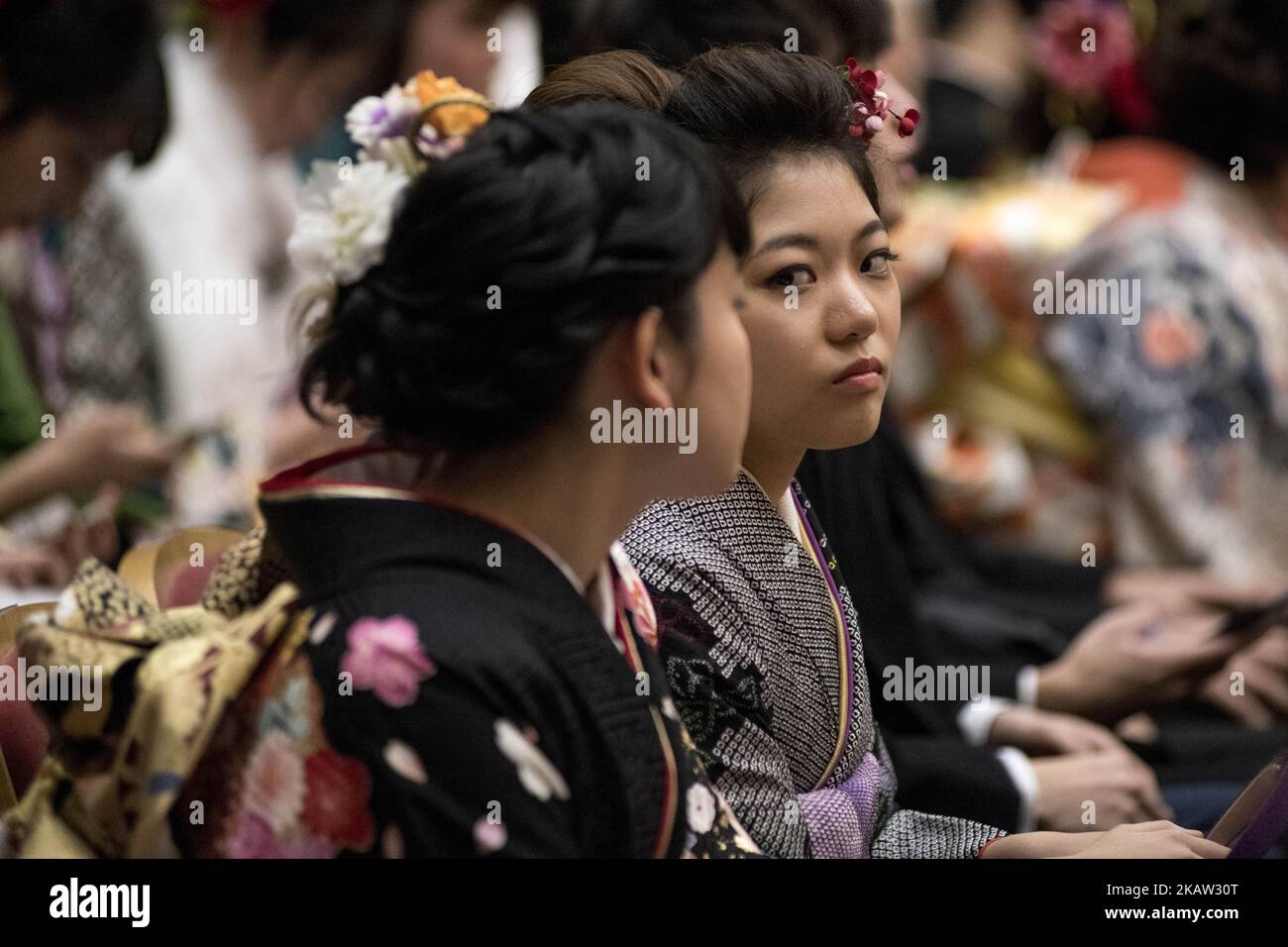 Girls dressed in colorful kimonos during their Coming of Age Day ...