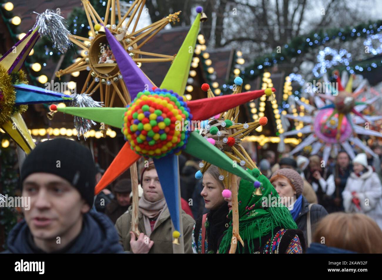 A huge crowd during the Christmas Stars Parade that take place in Lviv ...