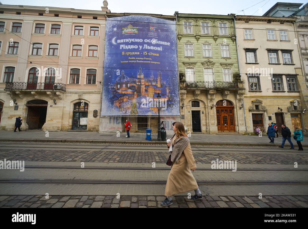 A view of Christmas Season bildboiard on a buiding in Lviv's Old Town ...