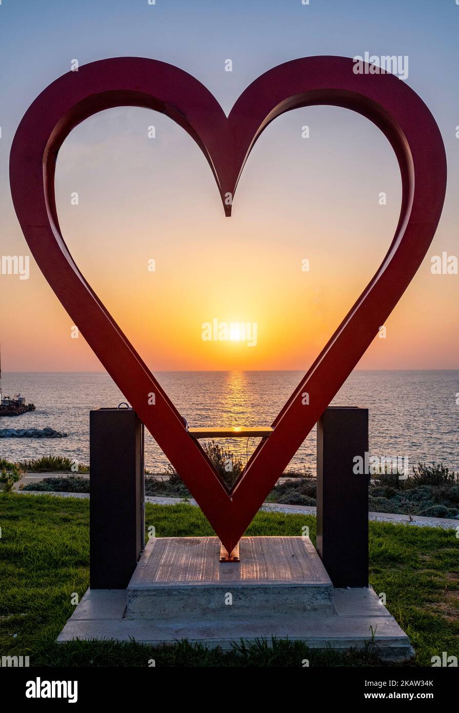 Giant heart shape sculpture with the sun setting behind, Cyprus Stock ...