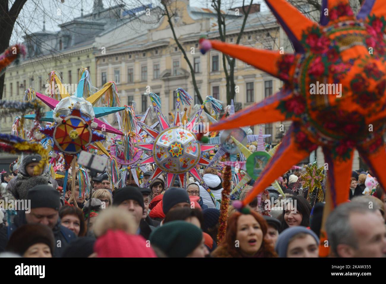 A huge crowd during the Christmas Stars Parade that take place in Lviv ...