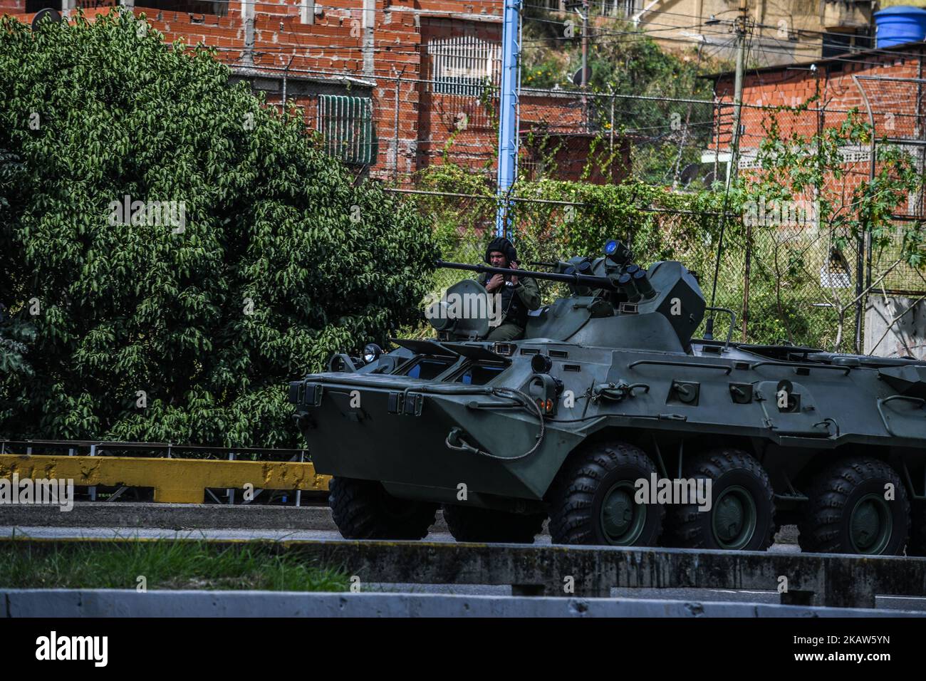 An armoured tank from the Venezuelan army drives along a highway in ...